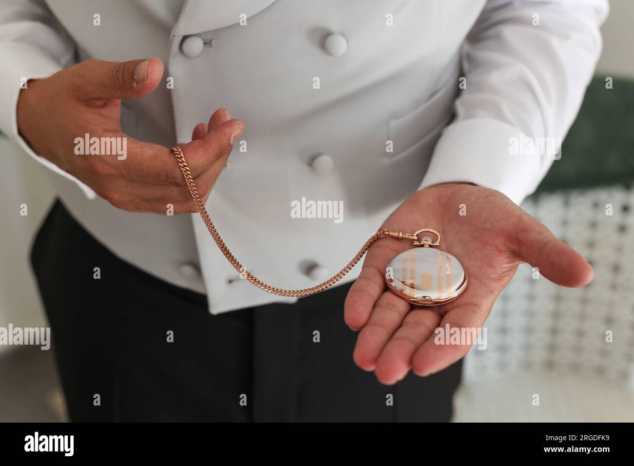 Man holding a precious antique pocket watch Stock Photo - Alamy