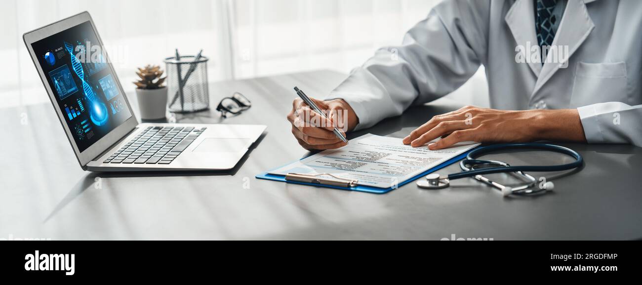 Doctor studying genetic disease in DNA research with laptop, analyze ...