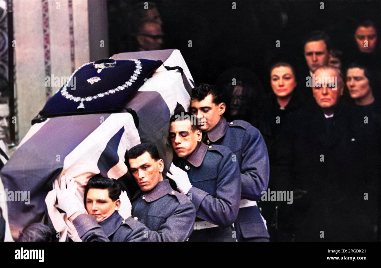 Watched by the mourning Churchill's, the massive oak coffin is carried ...