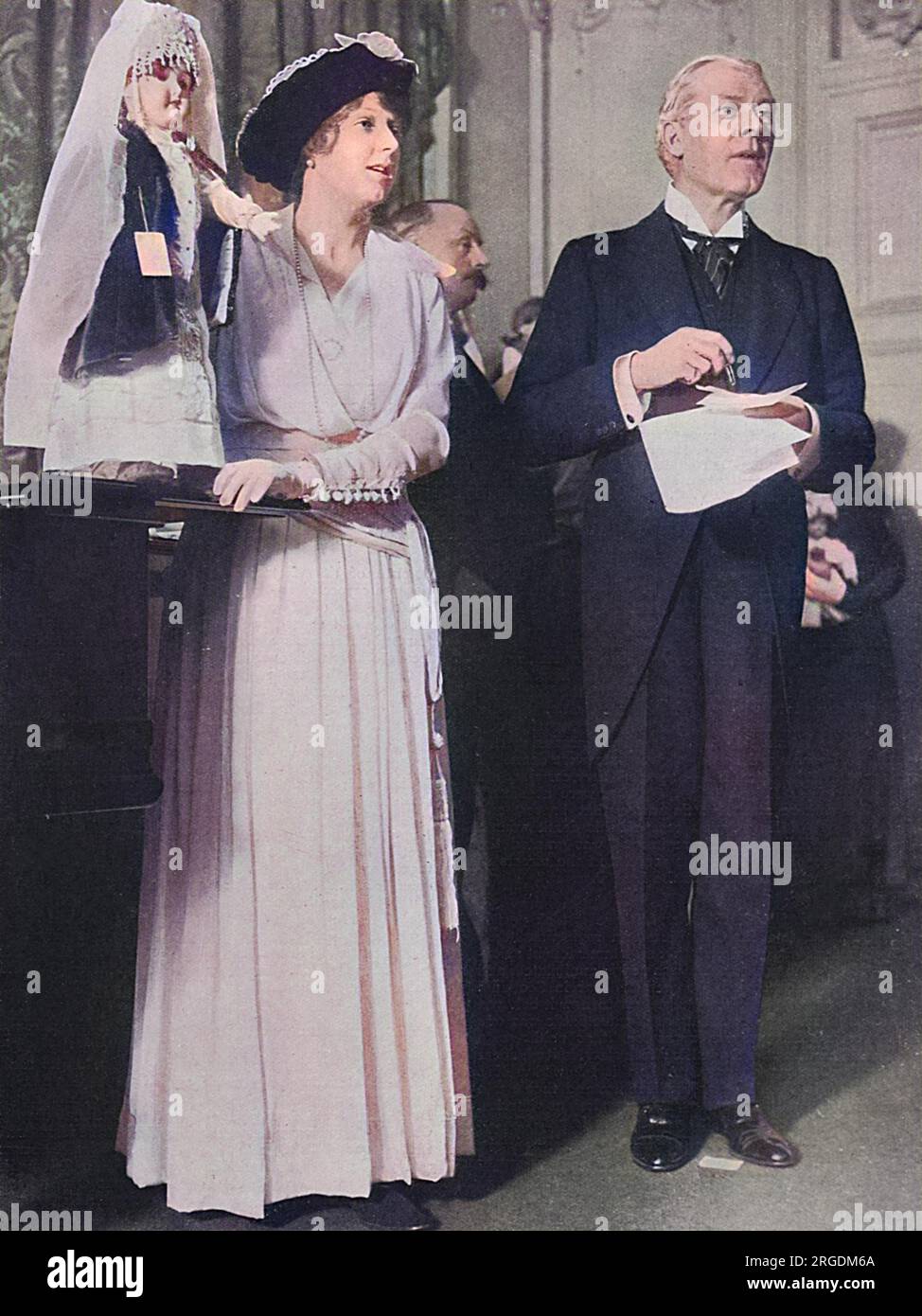 Actors, Sir George Alexander and Miss Marie Lohr, working hard at a ...