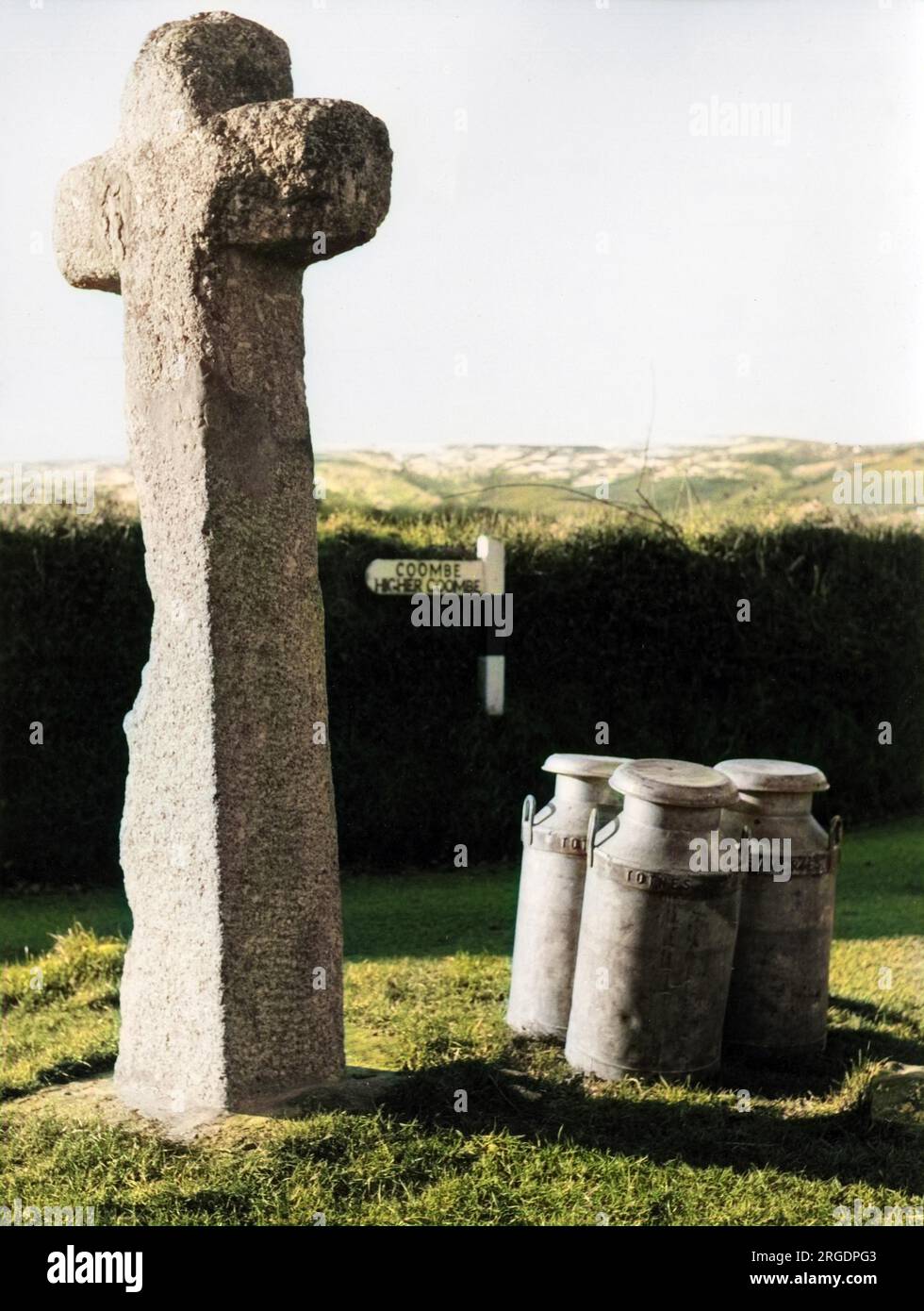 Milk churns from the farm, awaiting collection beside Scorriton Cross ...