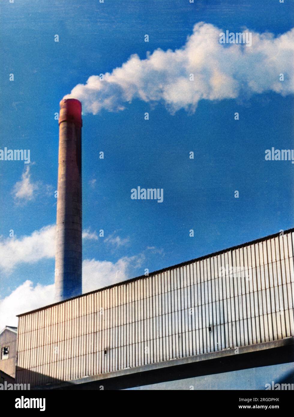 Study of a cement works chimney Stock Photo - Alamy
