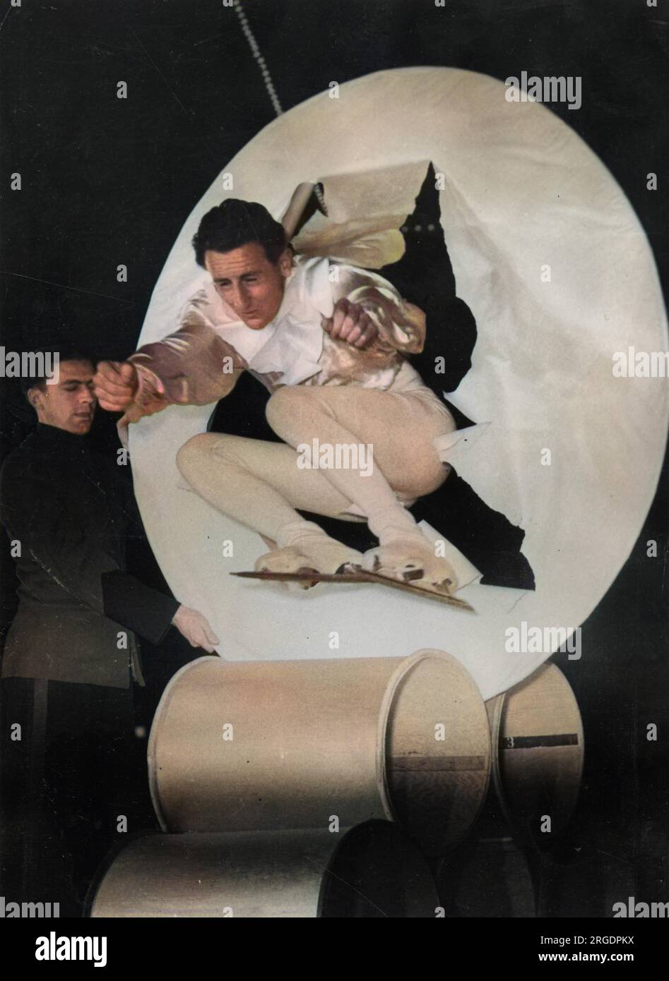 Stuntman HOPE BRAIN peforming a daring ice jump at the Ice Palais ...