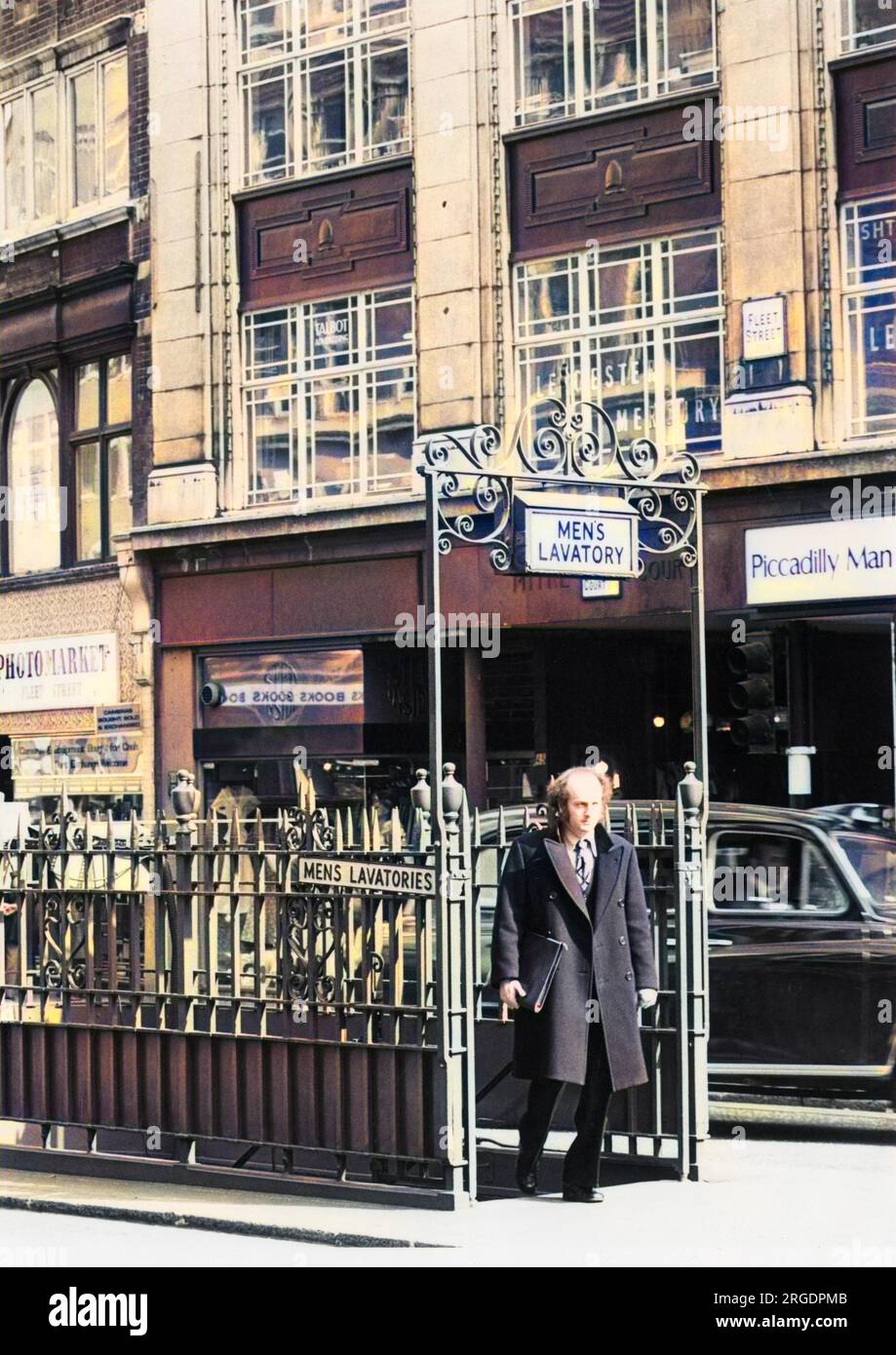 A rather dodgy looking gent emerges from a men's lavatory in central ...