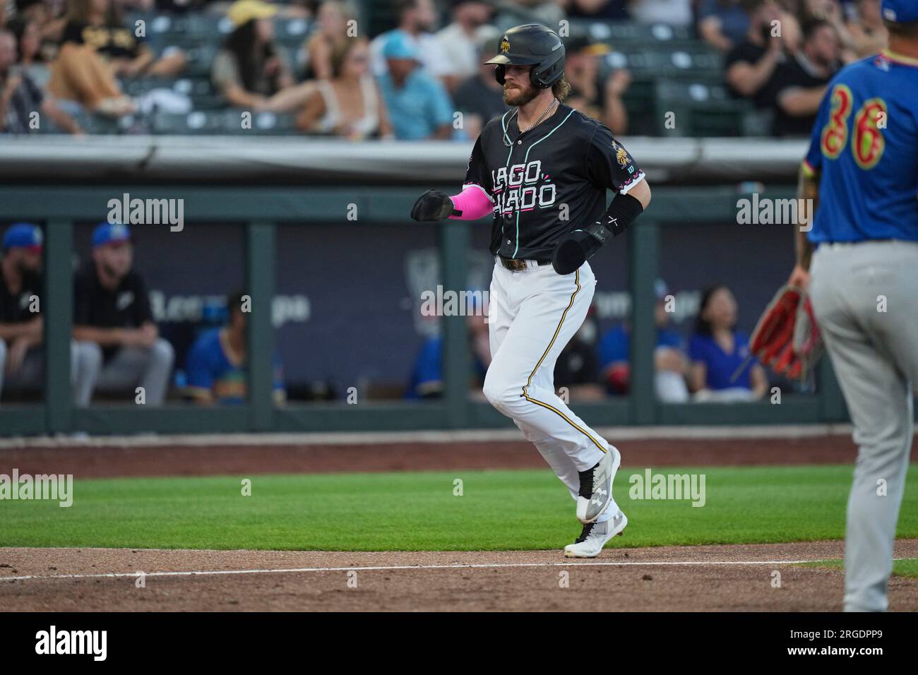 August 5 2023: Salt Lake first baseman Trey Cabbage (20) scores a run ...