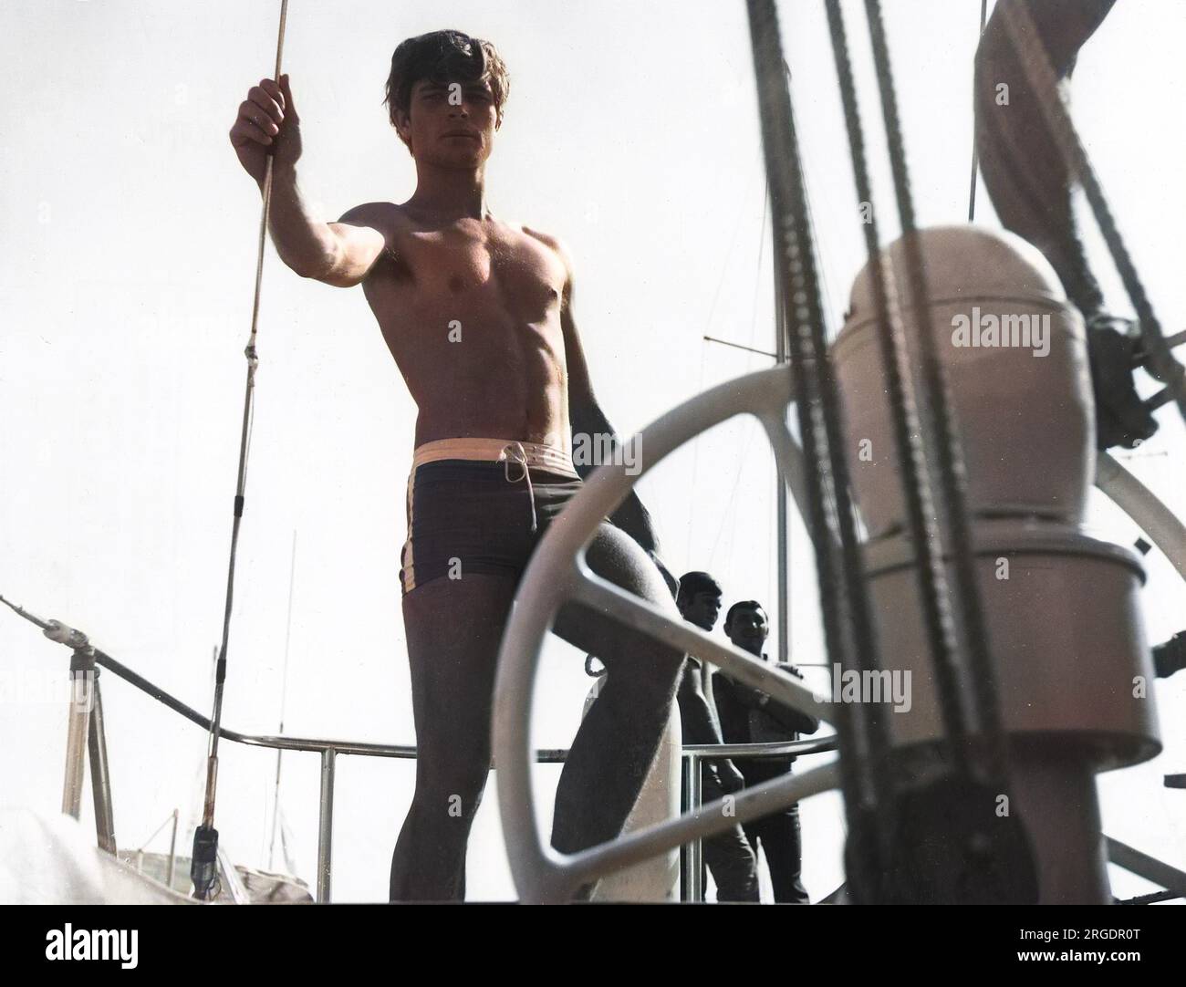 A handsome young man on the deck of the 'Bagaduce' sailing ship Stock ...