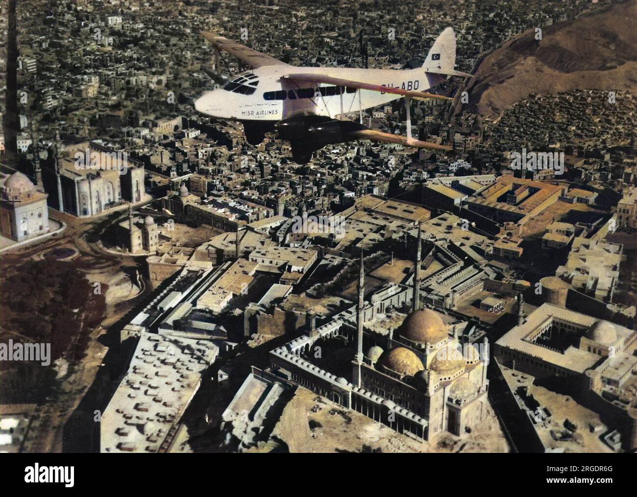 A De Havilland 86 plane flying over Cairo, Egypt, clearly showing the ...