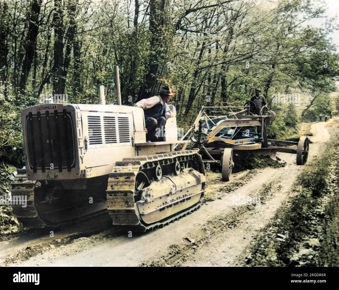 Making roads through the wilds using a giant caterpillar tractor, 35 ...