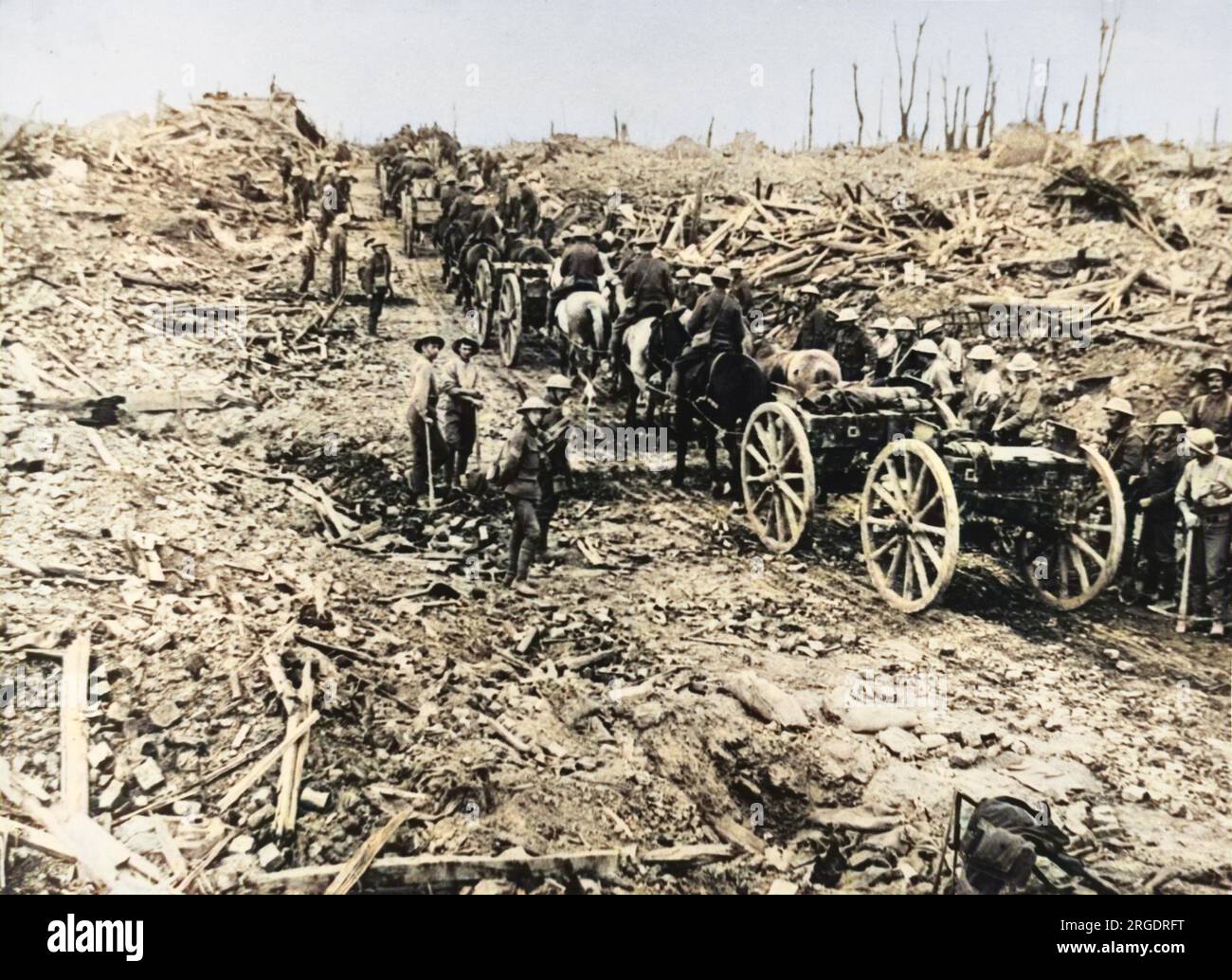 A convoy of British ammunition carts passes through the devastated ...