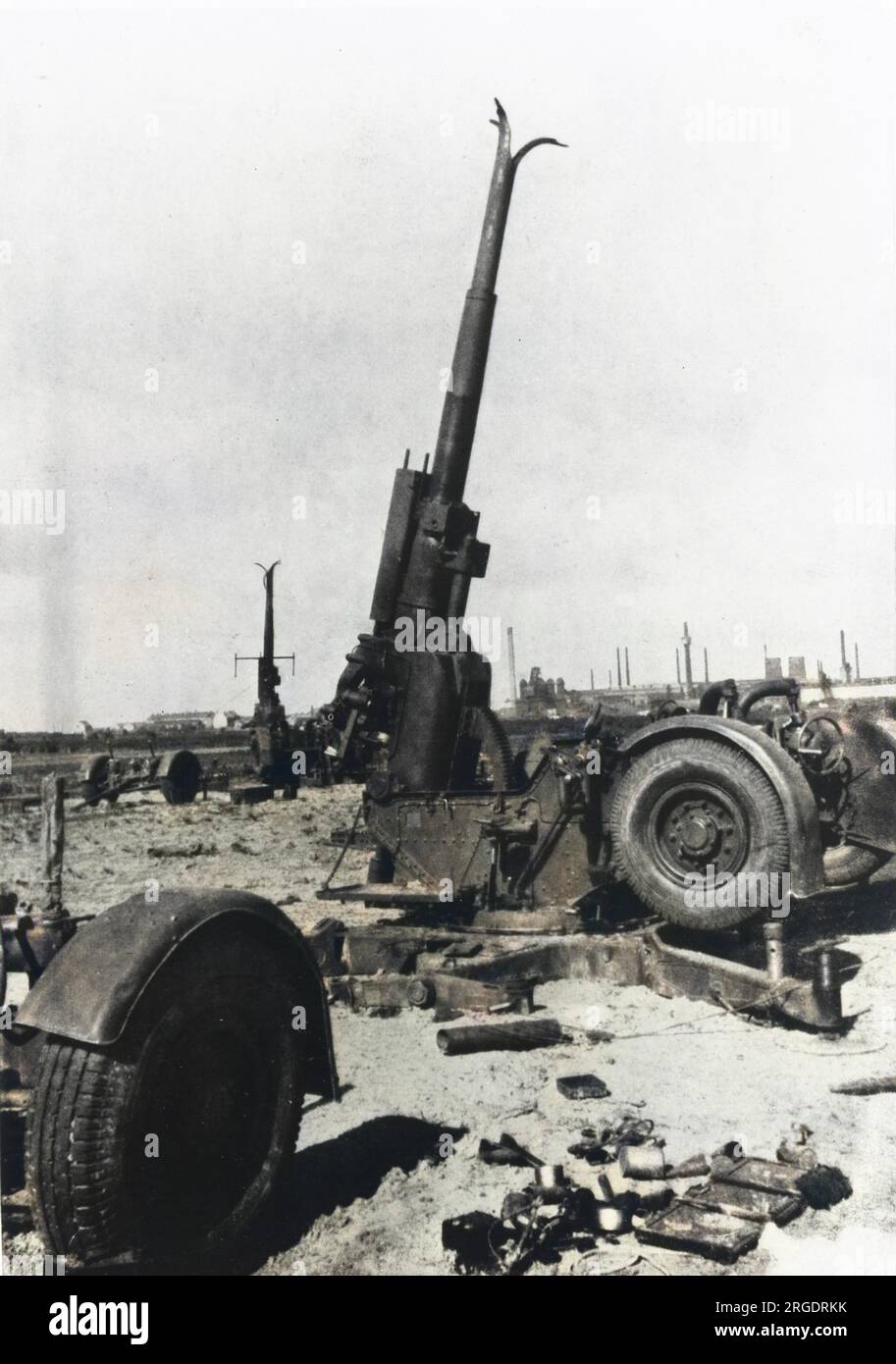 Equipment left at Dunkirk including this destroyed British flak gun ...