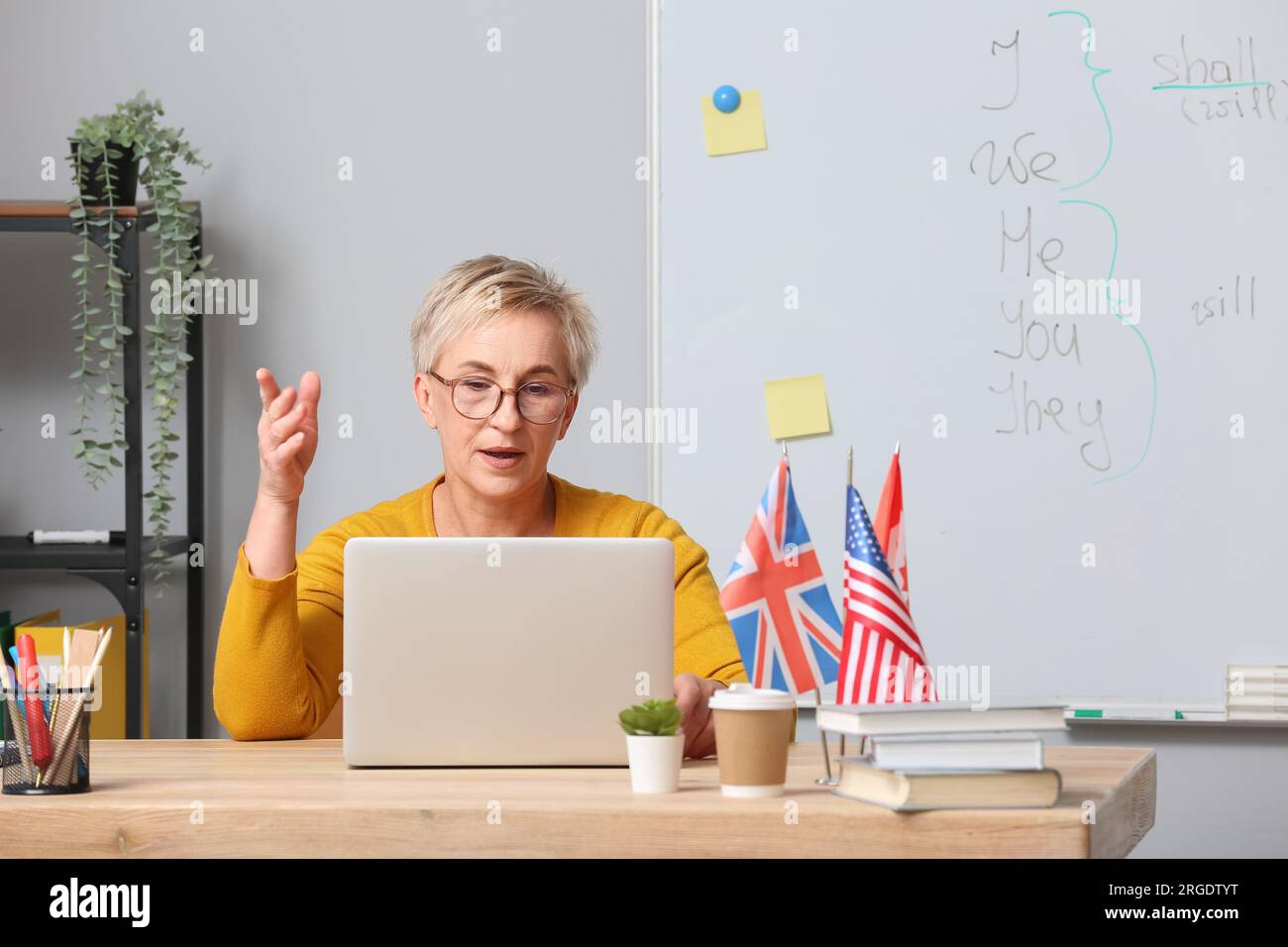 Teacher giving online classes hi-res stock photography and images - Alamy
