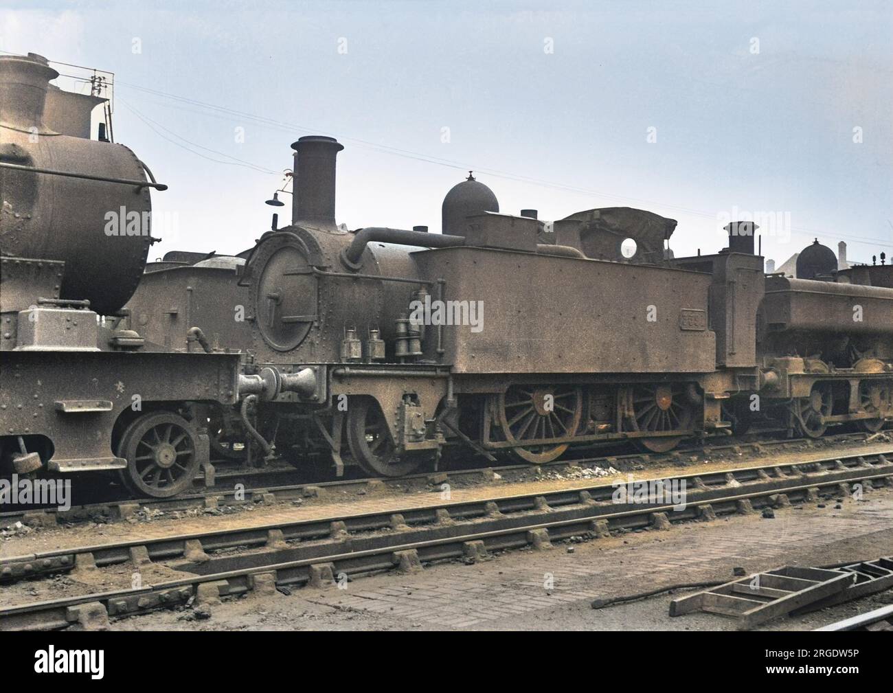 A steam engine on a railway track Stock Photo - Alamy