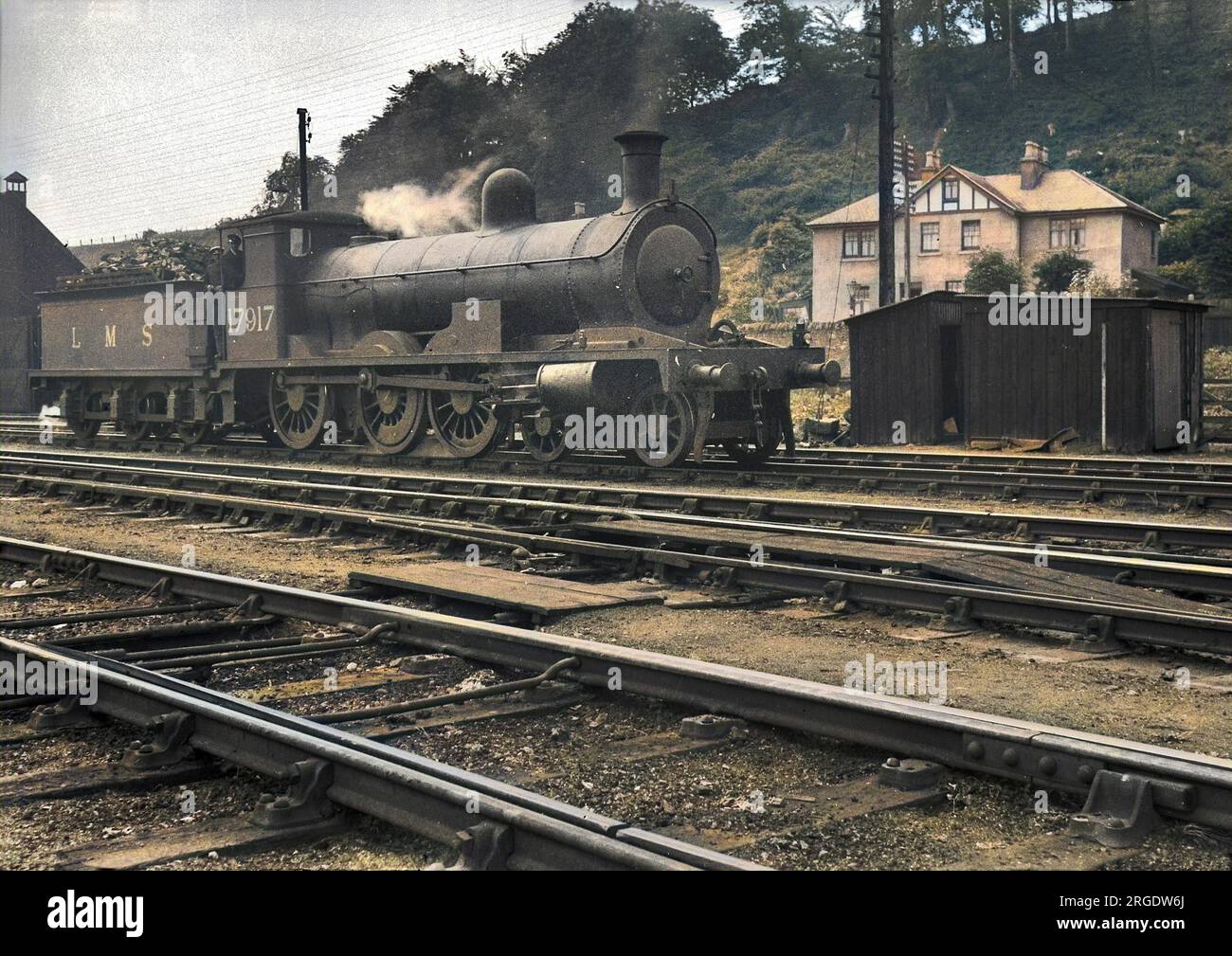 An LMS (London, Midland and Scottish) steam engine and tender on a ...
