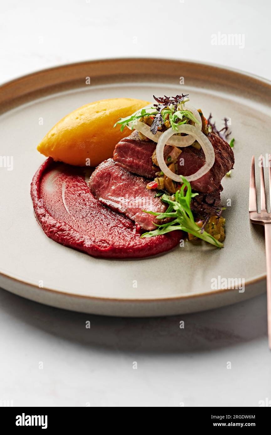 Lamb backstrap fillet, sweet potato mash, blood plum romesco, pickled ...