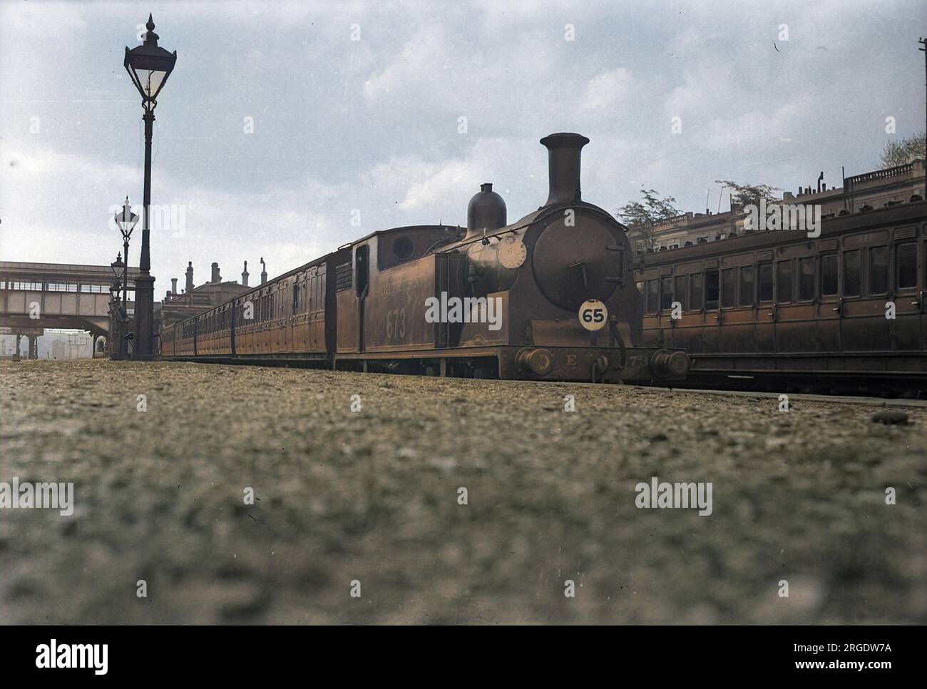 A Southern steam engine with carriages attached, standing in a railway ...