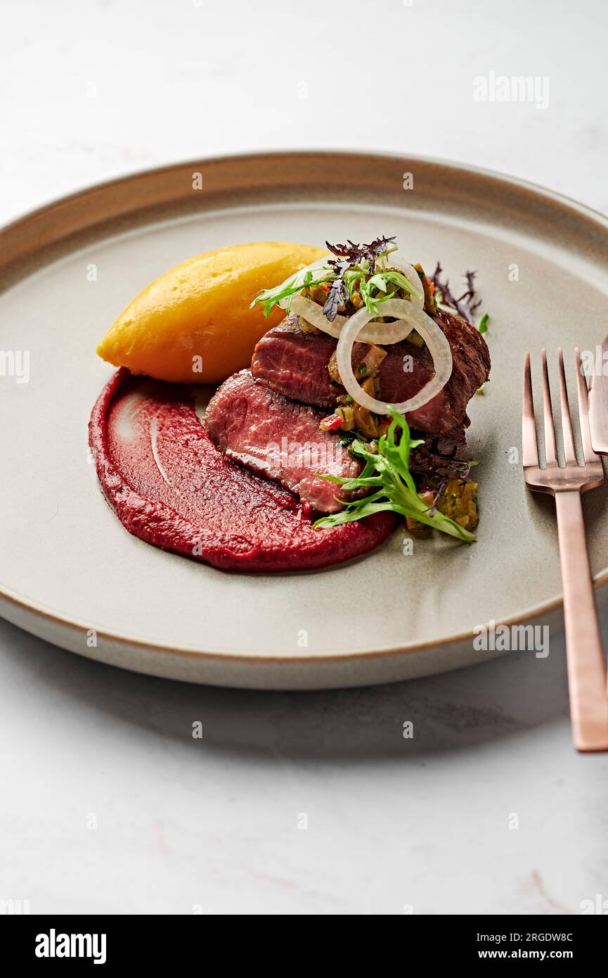 Lamb backstrap fillet, sweet potato mash, blood plum romesco, pickled ...