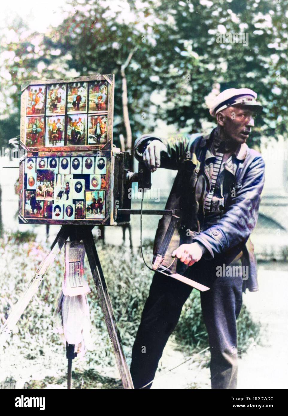 A Russian street photographer with his camera and tripod in Moscow ...