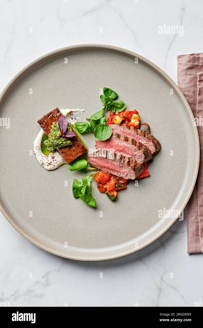 Char-grilled lamb backstrap, pressed lamb shoulder, honey lemon yoghurt ...