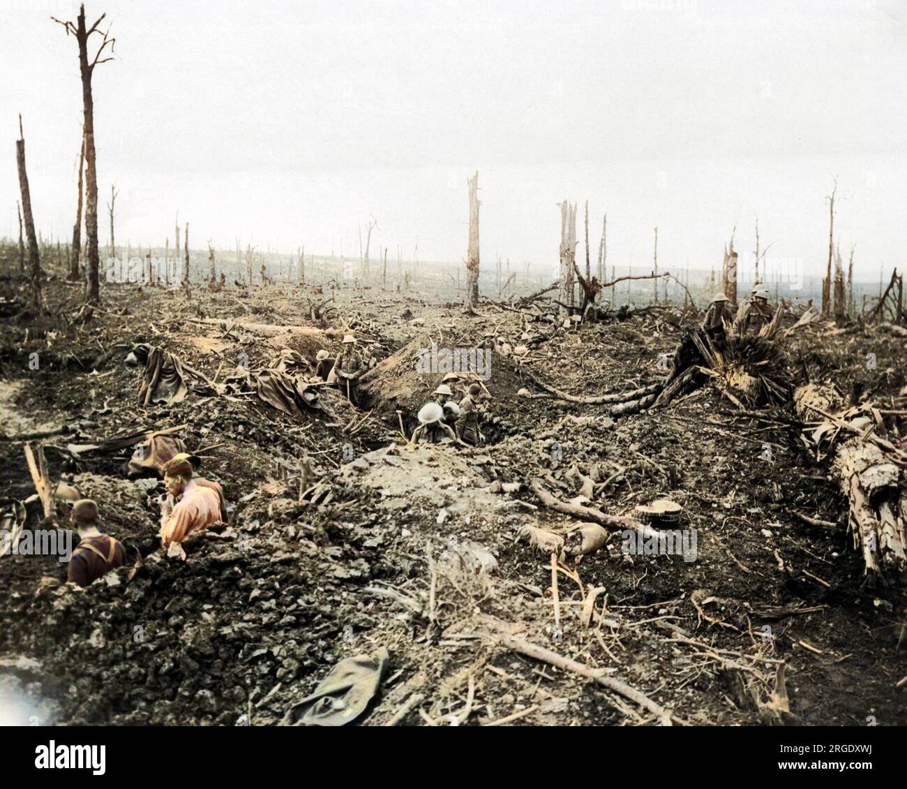 British soldiers digging a communication trench through what was once ...