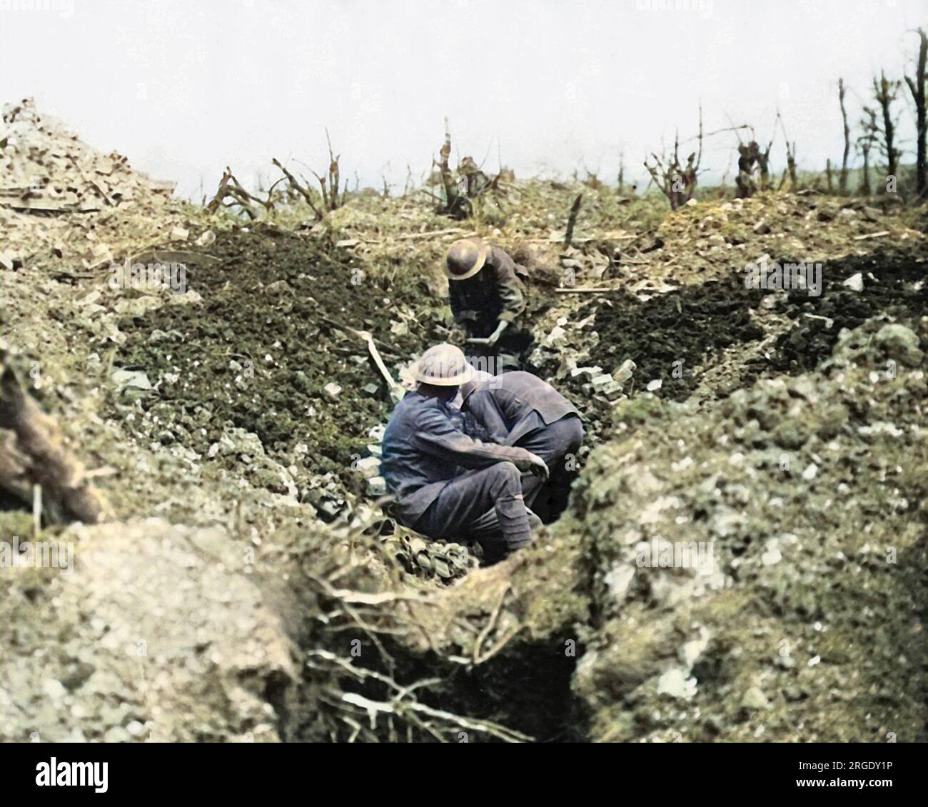 Men of a Worcestershire regiment digging a communication trench near ...