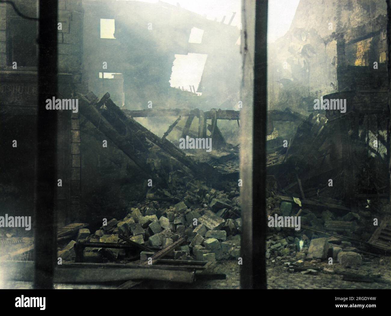 A burning building in Bapaume, France, on the Western Front during ...