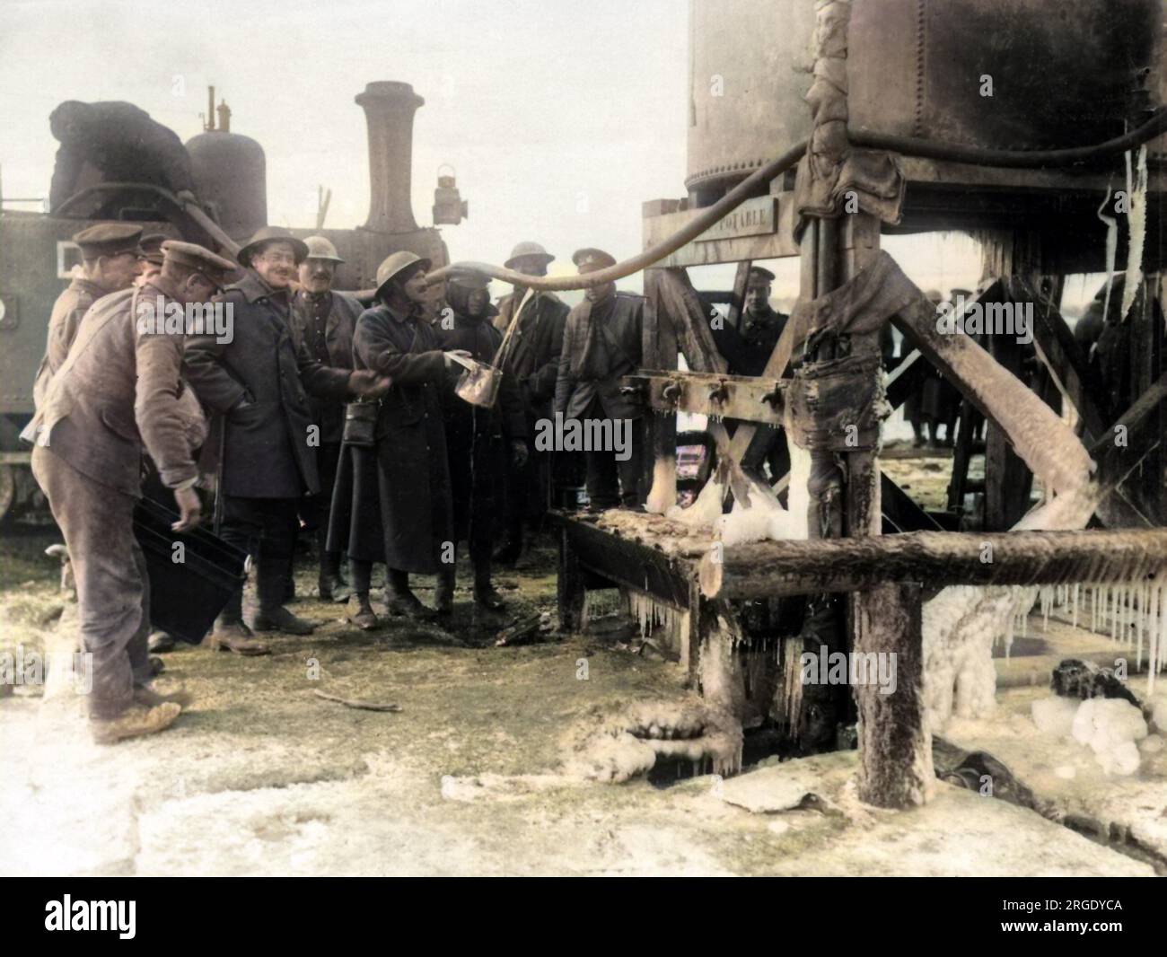 British soldiers taking in water for their train transport on their way ...