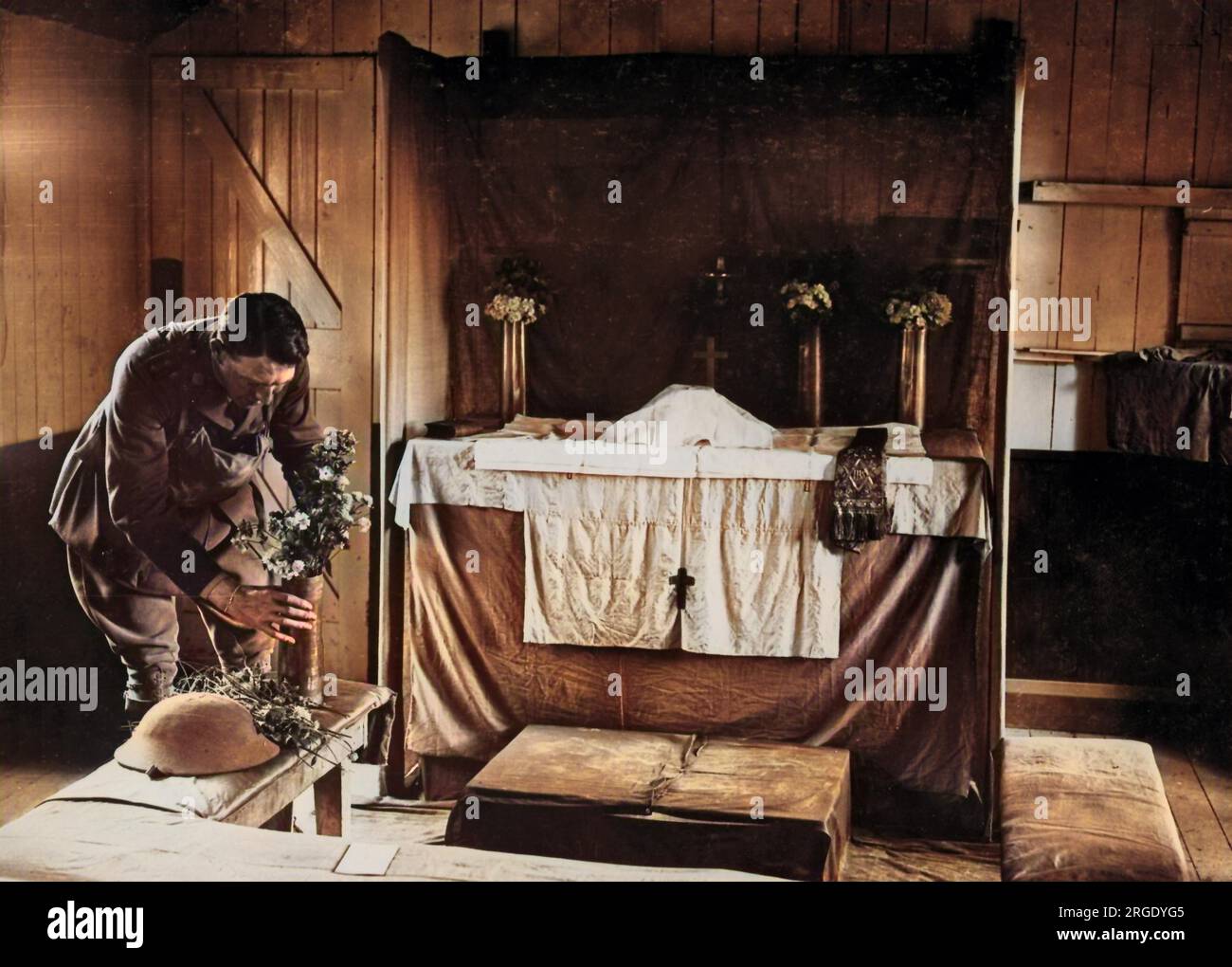 A British army padre in a makeshift church not far from the Western ...