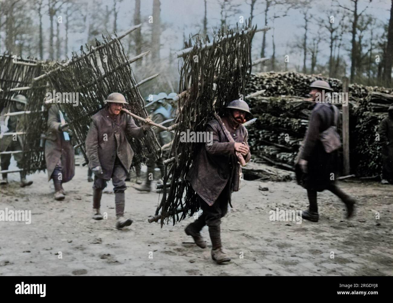 British soldiers carrying trench supports during construction work on ...