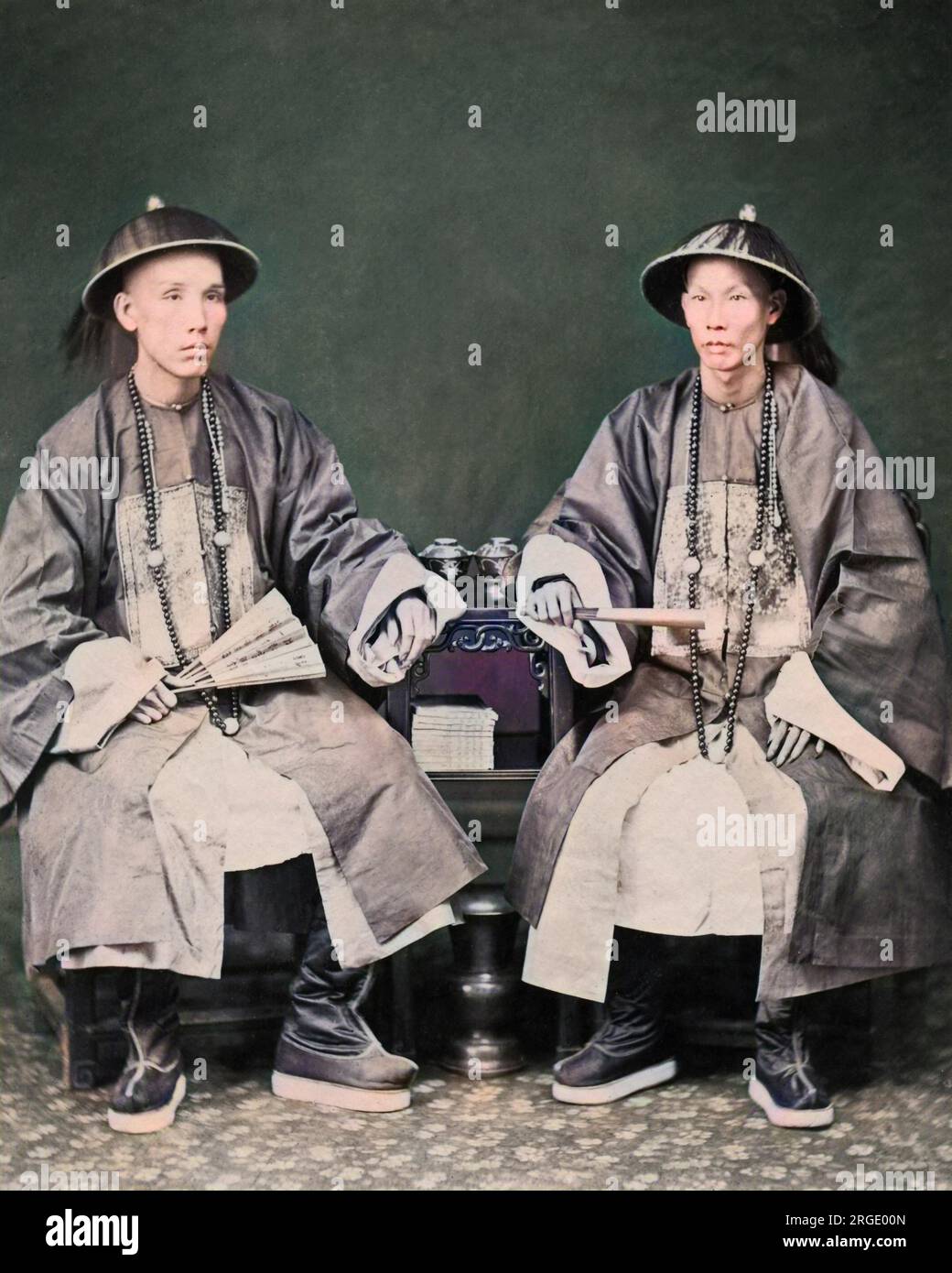 Two Chinese men in traditional costume Stock Photo - Alamy