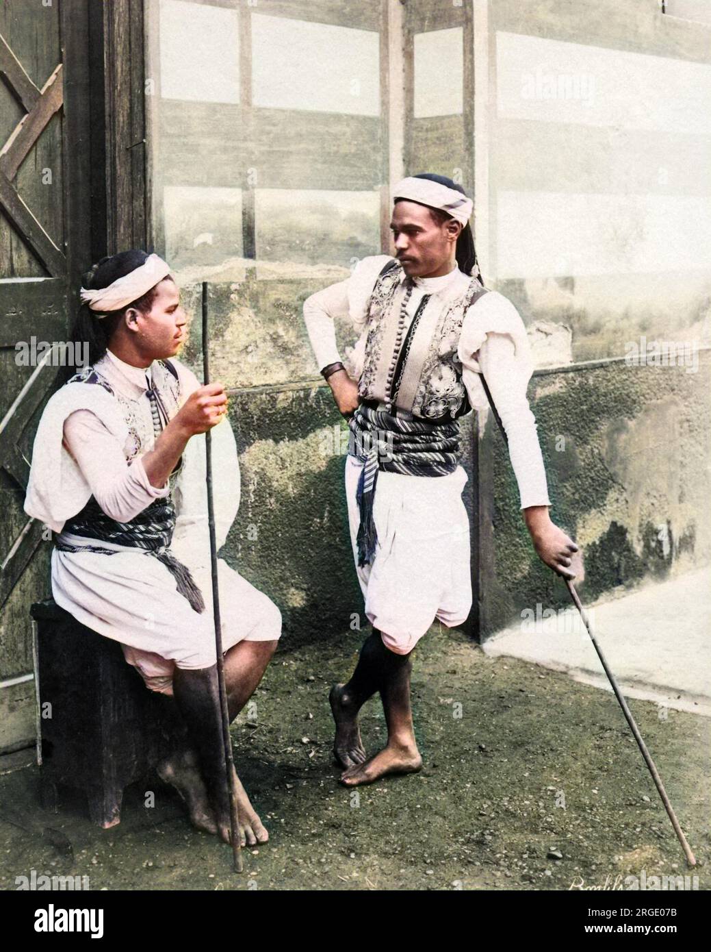 Two footmen of a horse-drawn carriage known as a Sais Courant, Egypt ...