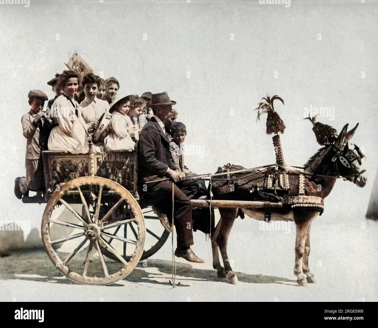 People on a decorated donkey cart, Naples, Italy Stock Photo - Alamy