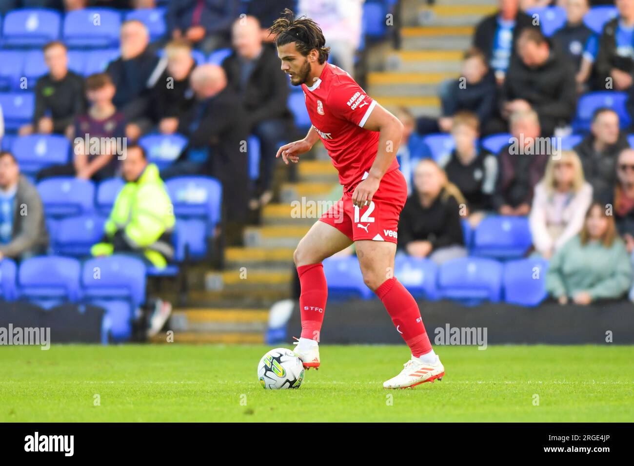 Tom Brewitt (12 Swindon Town) controls the ball during the Carabao Cup ...