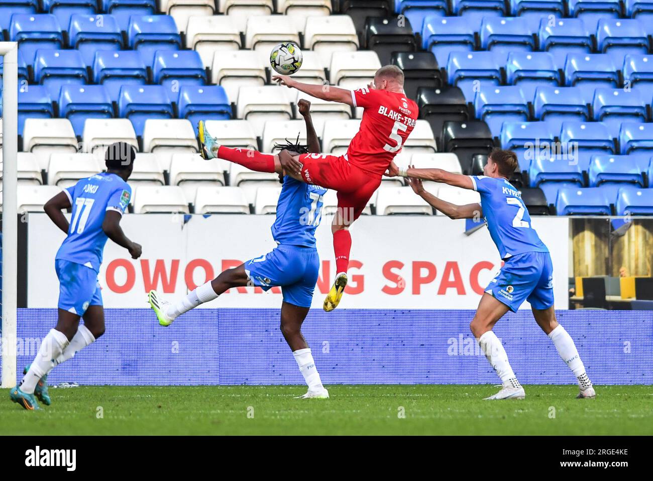 Frazer Blake Tracy (5 Swindon Town) challenges for the ball during the ...