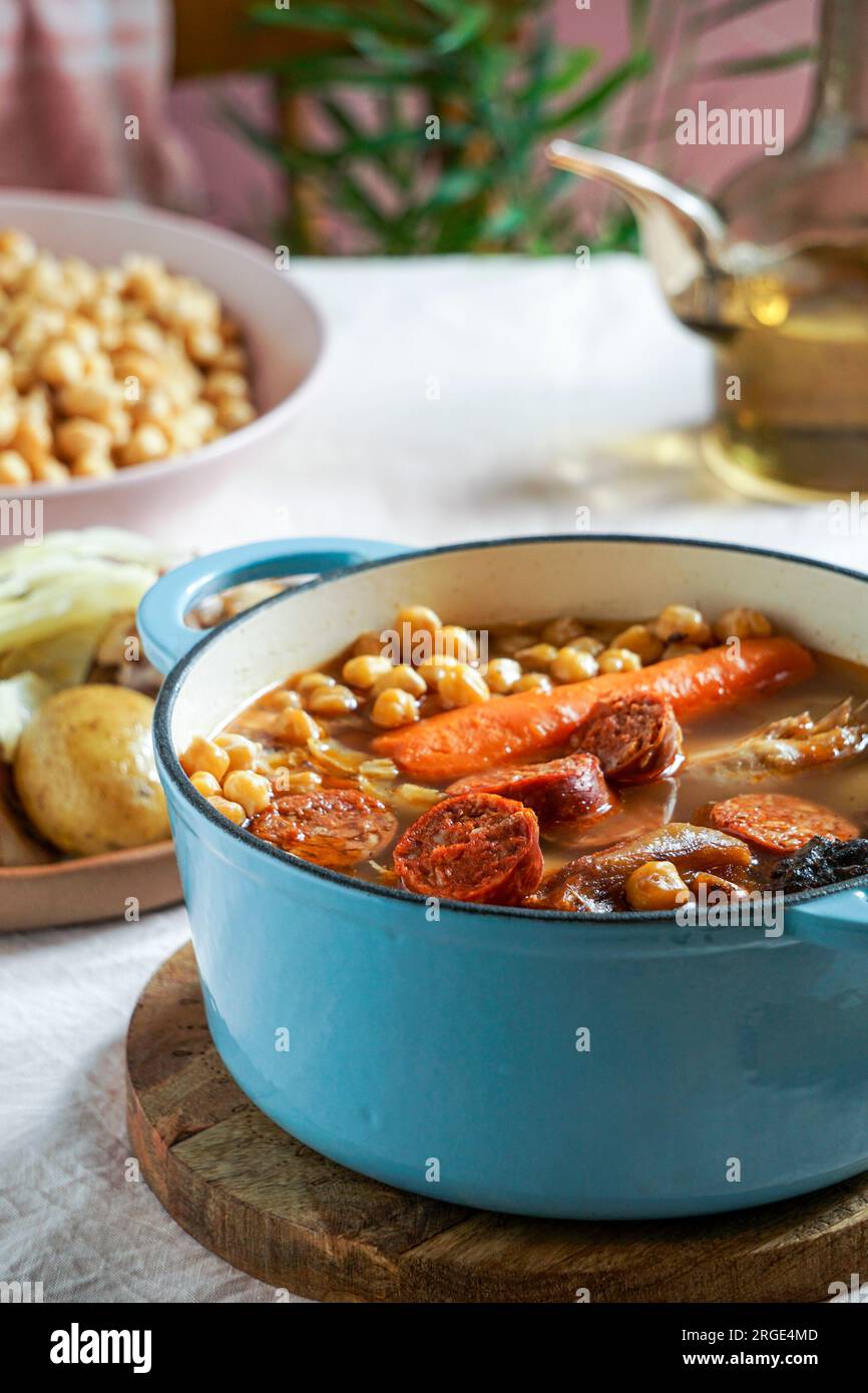 Cocido Madrileño, a traditional Spanish meal, chickpea-based stew from ...