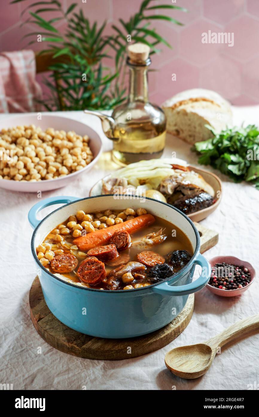 Cocido Madrileño, a traditional Spanish meal, chickpea-based stew from ...
