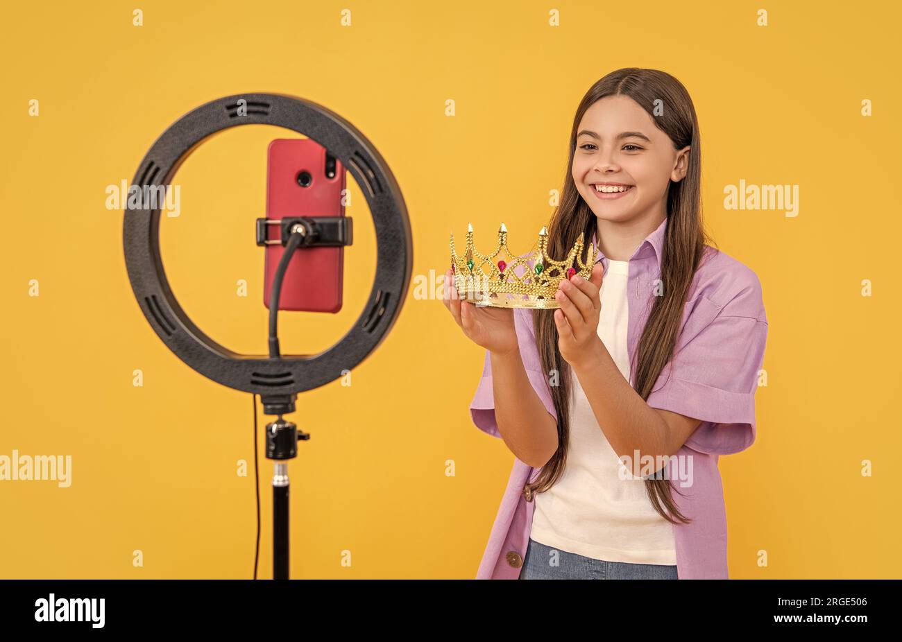 cheerful teen blogger girl with crown on background. photo of teen ...