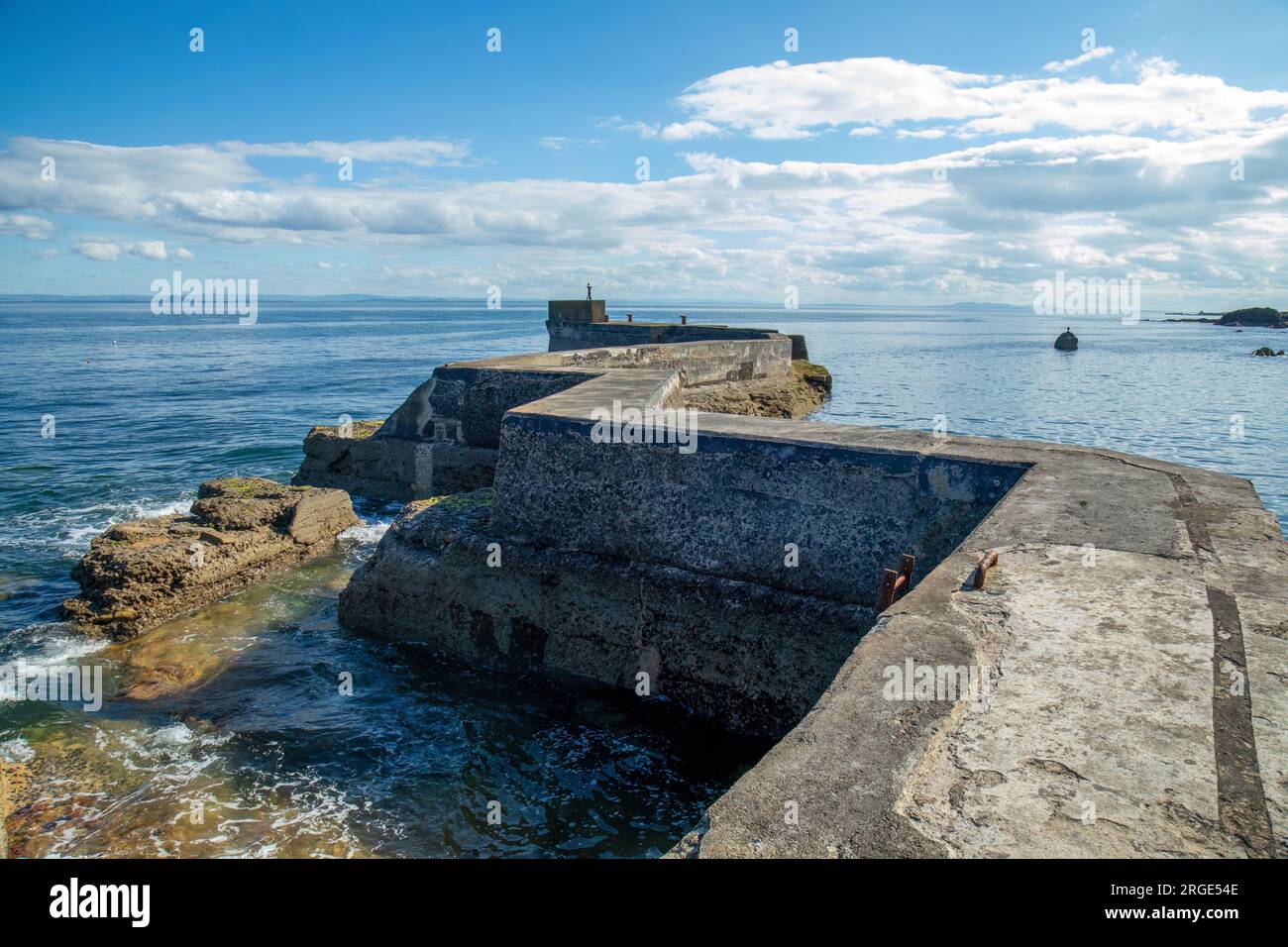 Saint Monan's zig zag pier in Fife with blue ocean and sky Stock Photo ...