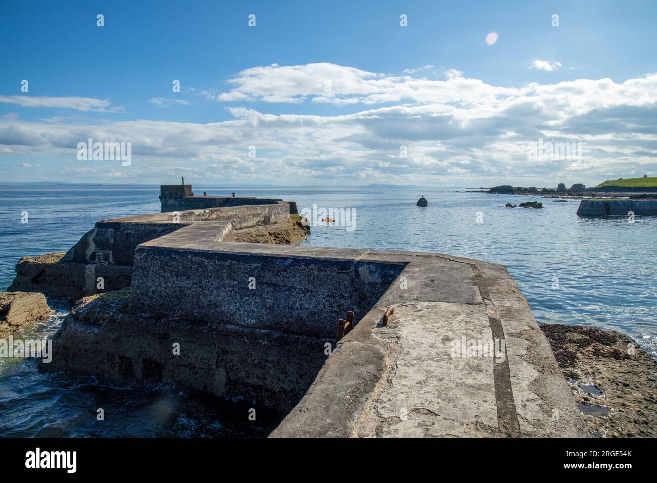 Saint Monan's zig zag pier in Fife with blue ocean and sky Stock Photo ...