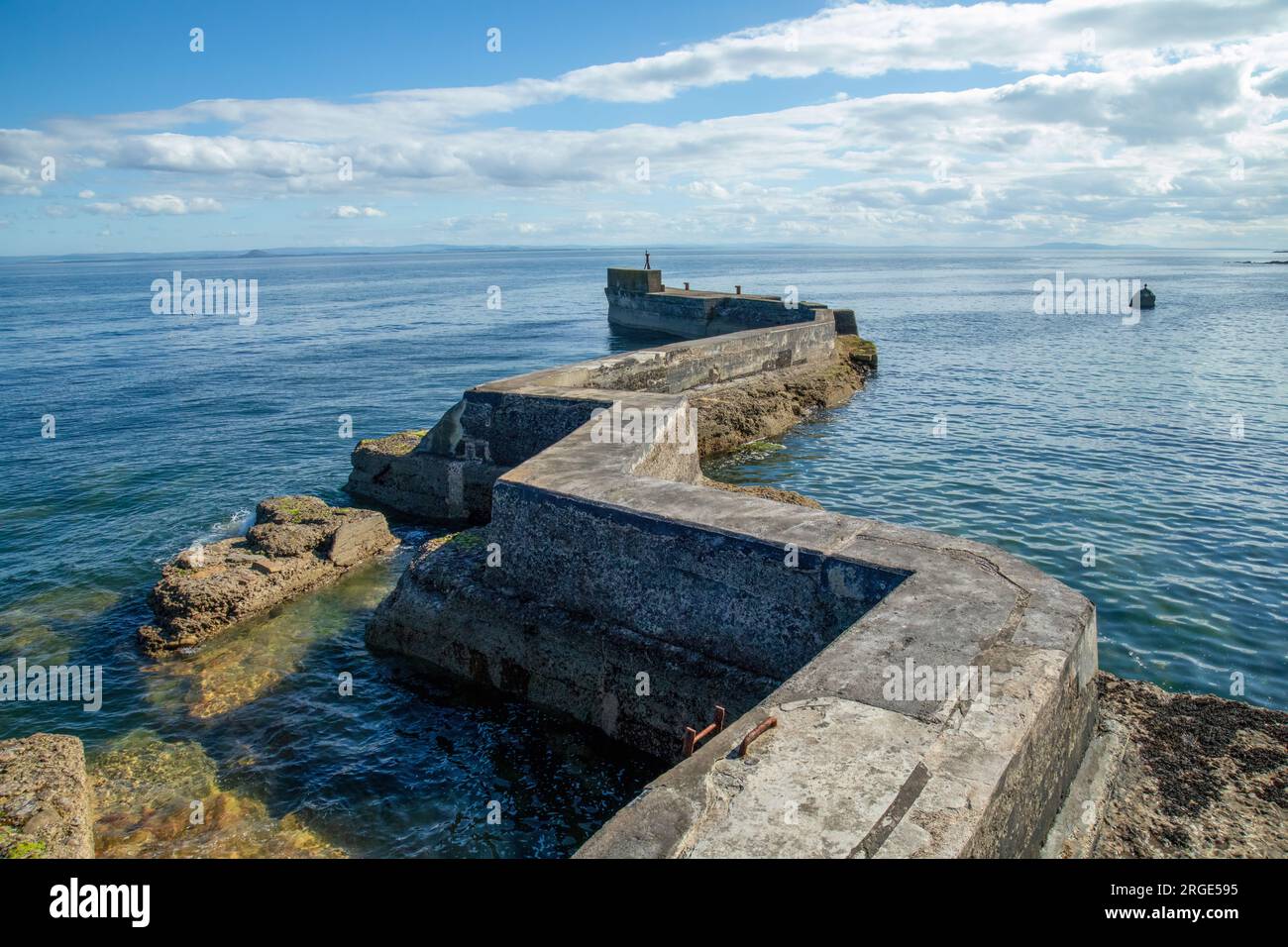 Saint Monan's zig zag pier in Fife with blue ocean and sky Stock Photo ...