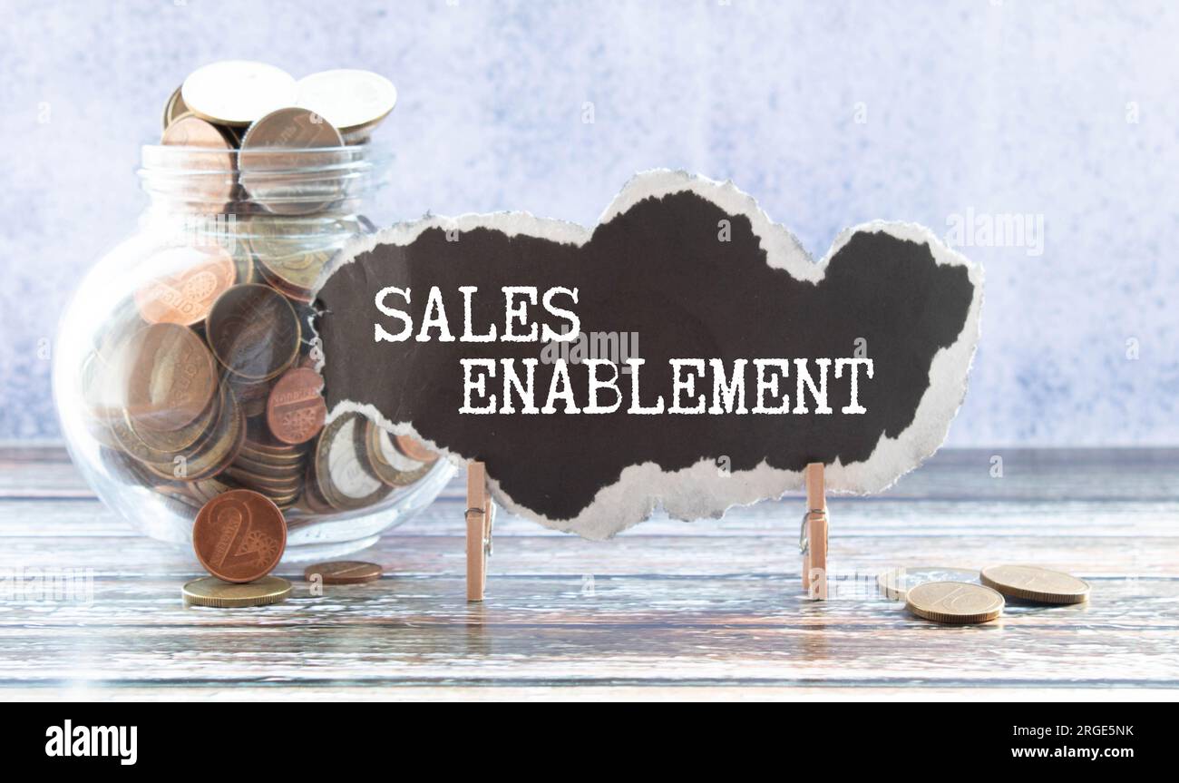 Business Concept.Text SALES ENABLEMENT writing on wooden puzzle with ...