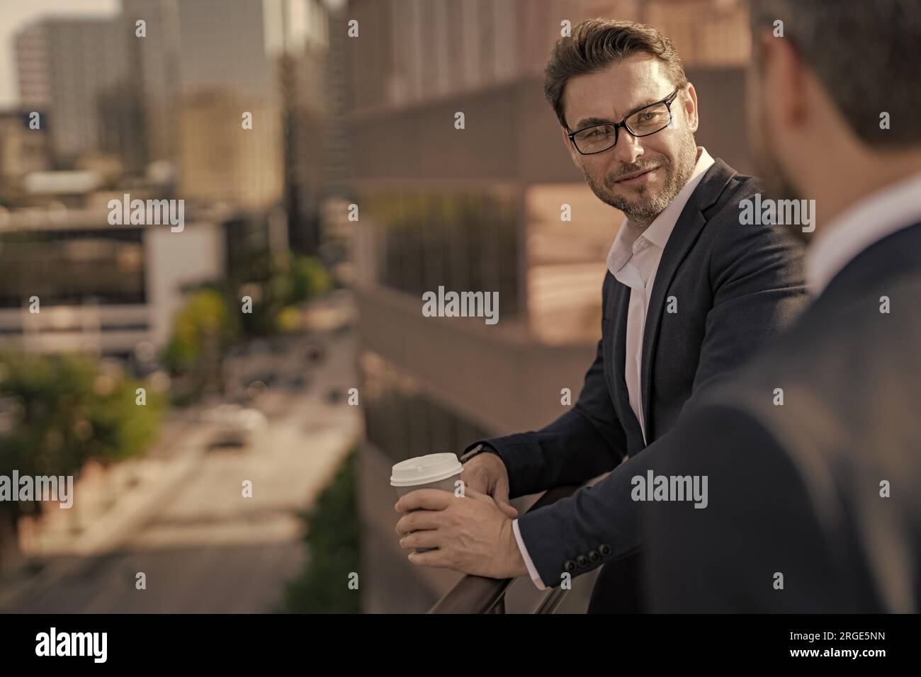 business men in suit at coffee break, selective focus. photo of ...
