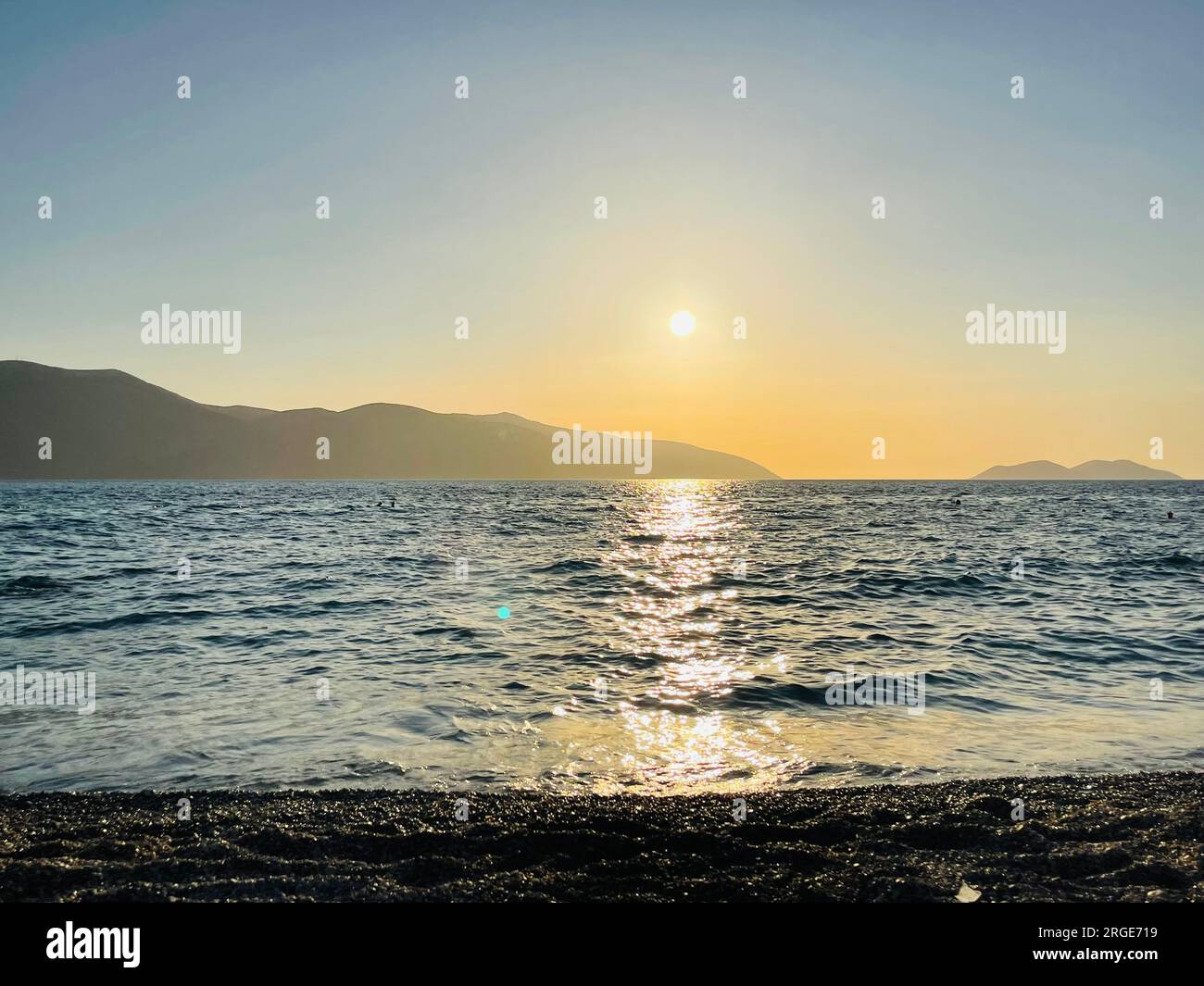 Scenic sunset over Ioninan sea in Vlore Albania Stock Photo - Alamy