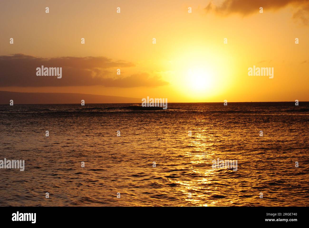 Maui sunset melting sun hi-res stock photography and images - Alamy