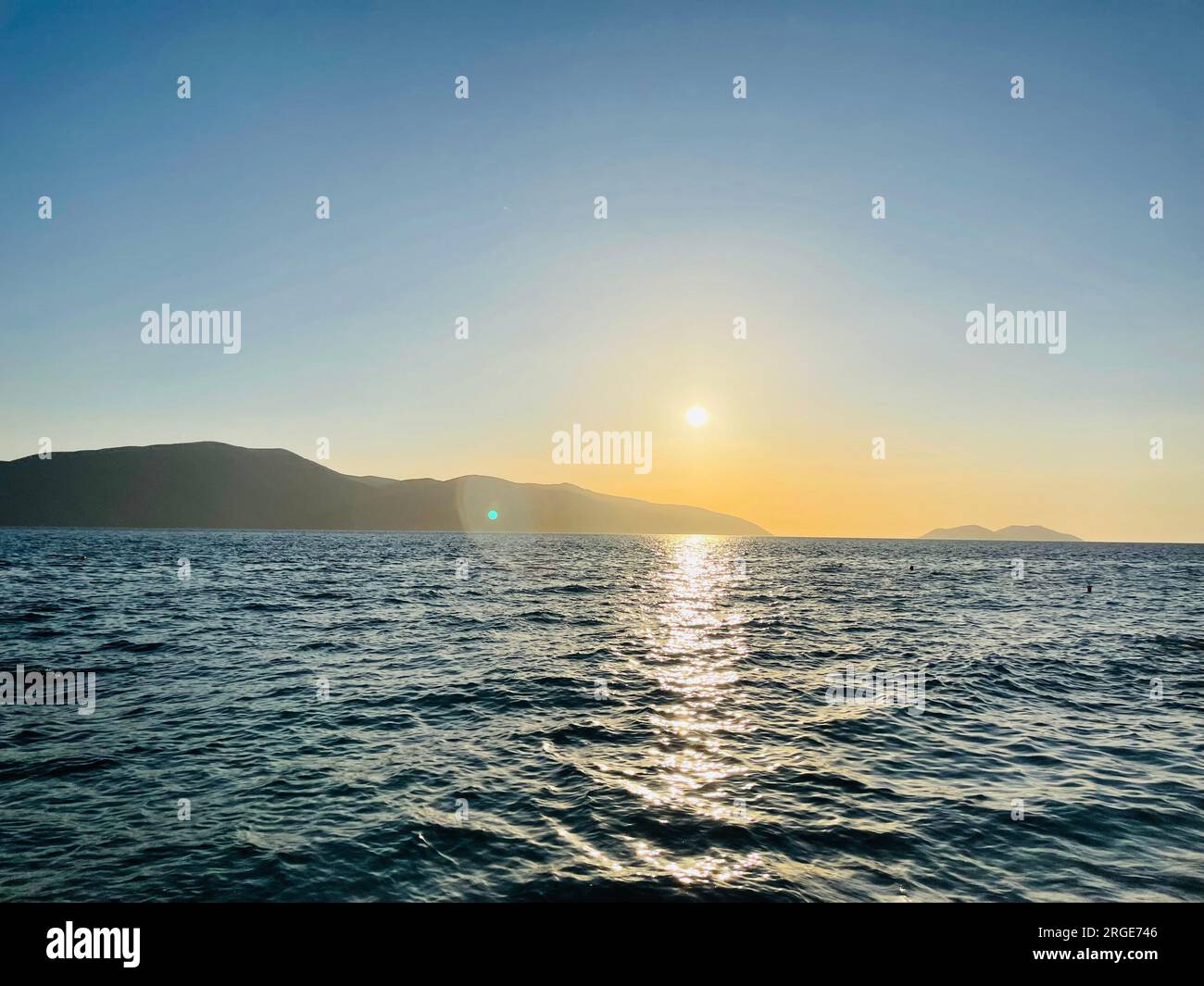 Scenic sunset over Ioninan sea in Vlore Albania Stock Photo - Alamy