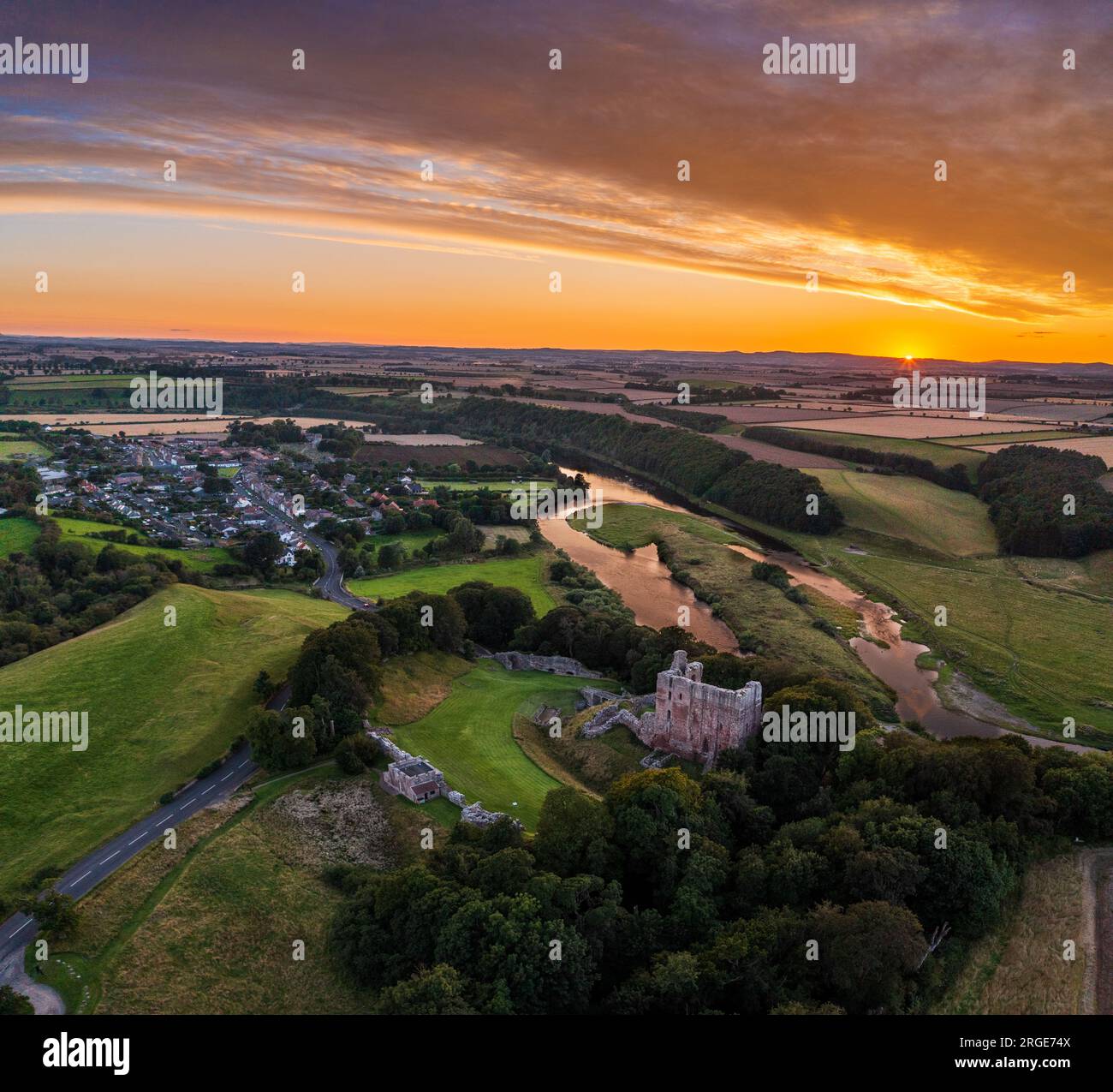 Sunset at Norham Castle sitting high above the River Tweed on the ...