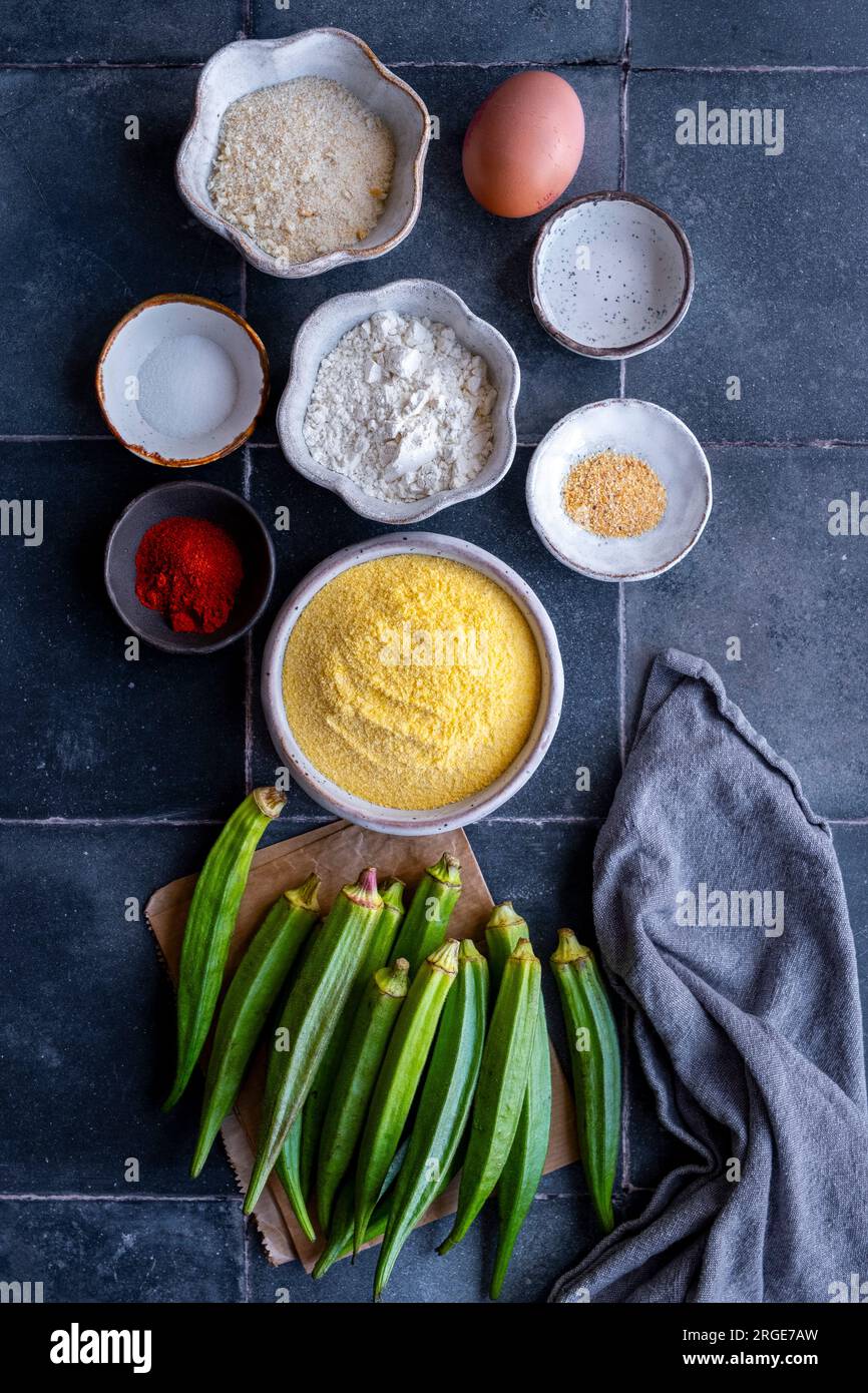 Fresh okra, cornmeal, flour, bredcrumbs, egg, water, salt, paprika and ...