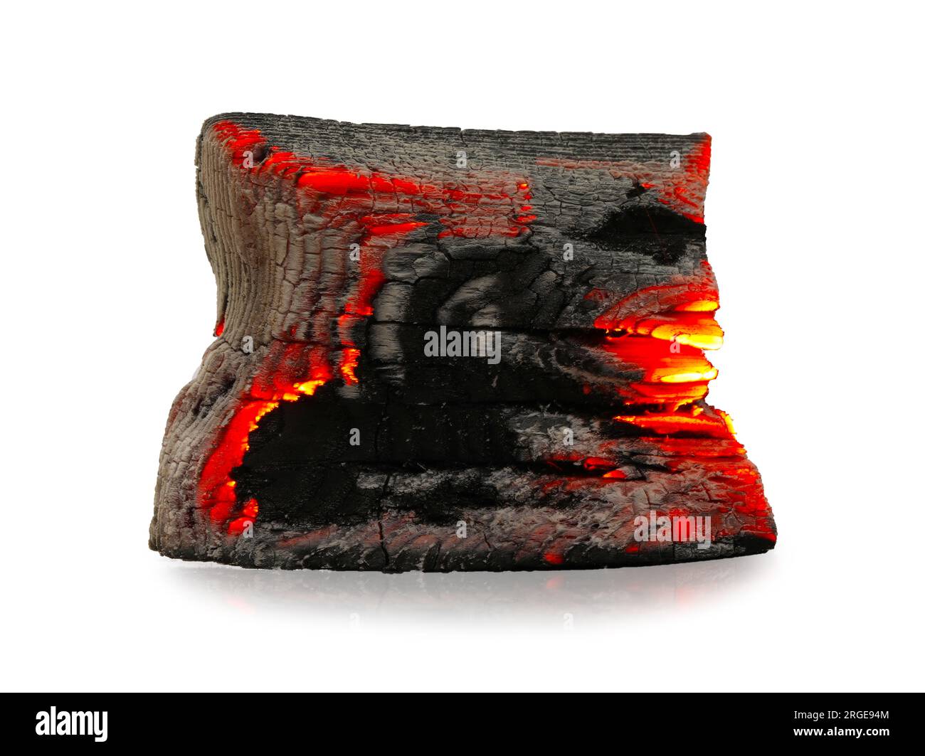 Piece of smoldering coal on white background Stock Photo - Alamy