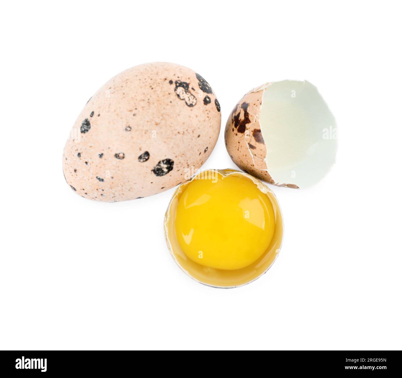 Whole and cracked quail eggs on white background, top view Stock Photo ...