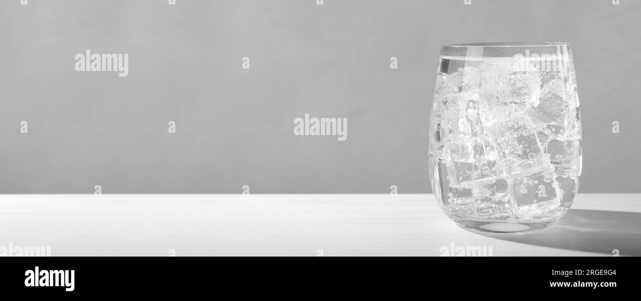 Refreshing soda water on white wooden table. Banner design with space for text Stock Photo - Alamy