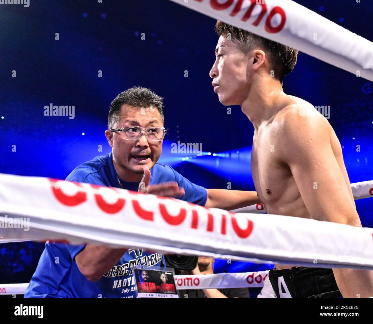Tokyo, Japan. 25th July, 2023. Japan's Naoya Inoue, right, listens to ...